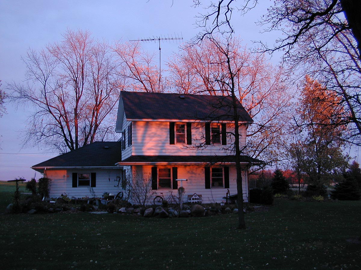 Wisconsin farmhouse at sunset